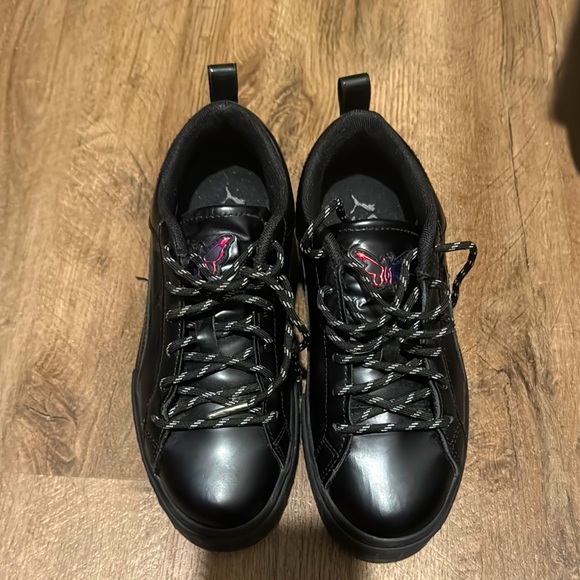 Puma | Shoes | Puma Black Leather Sneakers With Minimalist Design ...